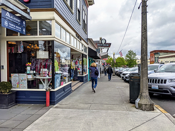 Historic main street shopping where antique treasures and modern needs coexist beautifully together.
