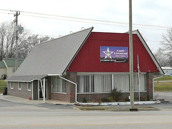 Star 63's distinctive red A-frame roof stands out like a Hollywood star who never forgot their small-town roots.
