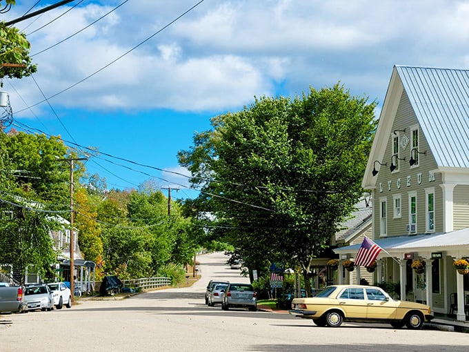 The museum in Tamworth sits quietly along tree-lined streets, its yellow clapboard and American flag embodying small-town New England charm.