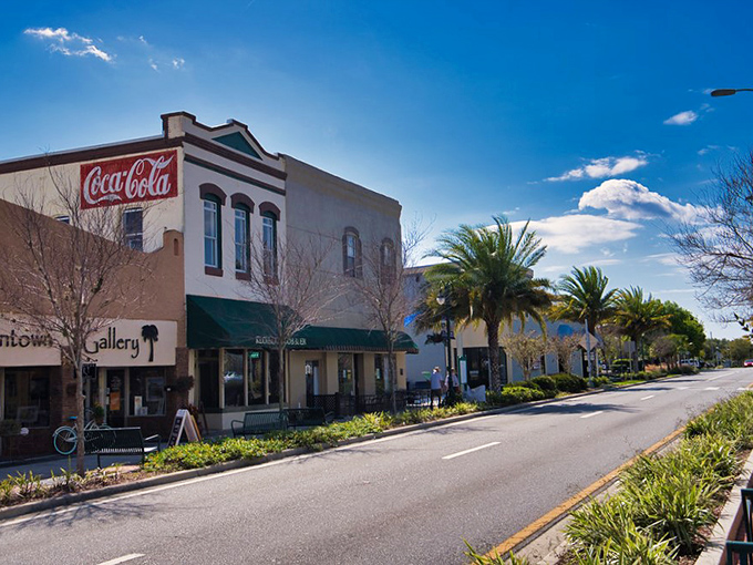 Titusville's vintage Coca-Cola sign whispers of simpler times. Palm trees and historic storefronts create affordable charm for budget-conscious retirees.