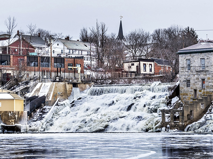 Vergennes' dramatic waterfall doesn't just provide scenery – it's nature's way of saying "Look at me!" in the middle of town.
