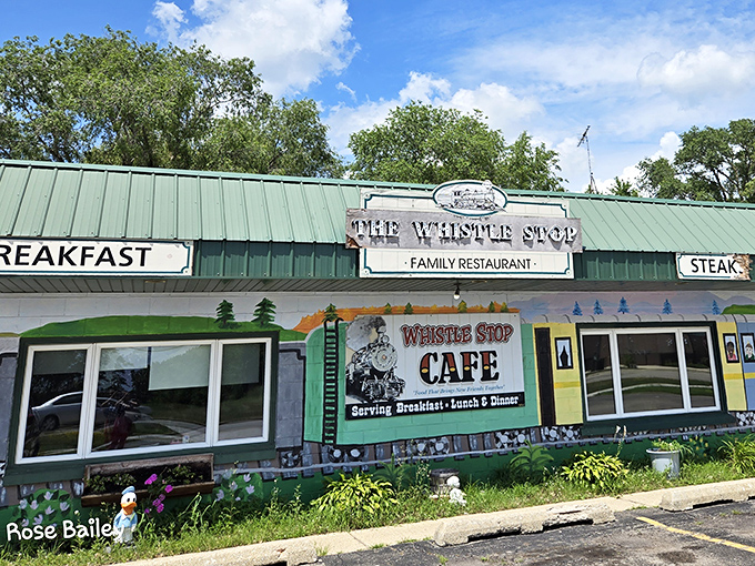All aboard for flavor! Whistle Stop's colorful exterior hints at the whimsical train-themed experience waiting inside.