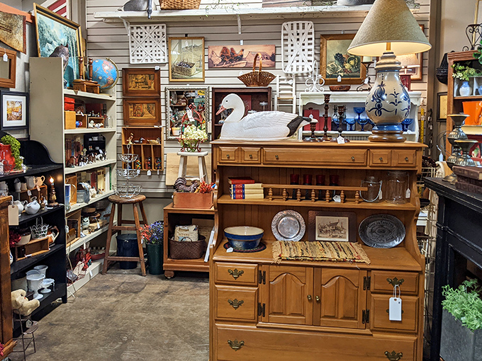 Wooden hutches display vintage dishes like family heirlooms ready for their next loving home.
