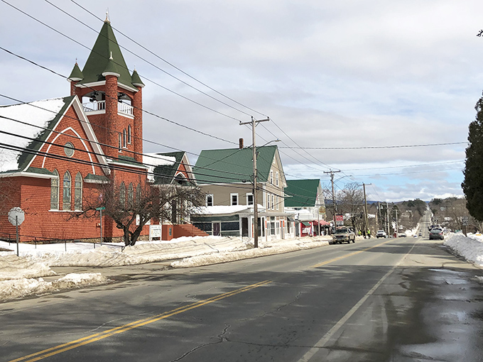 This red brick church tower stands sentinel over the community, a beacon of stability in an ever-changing world.