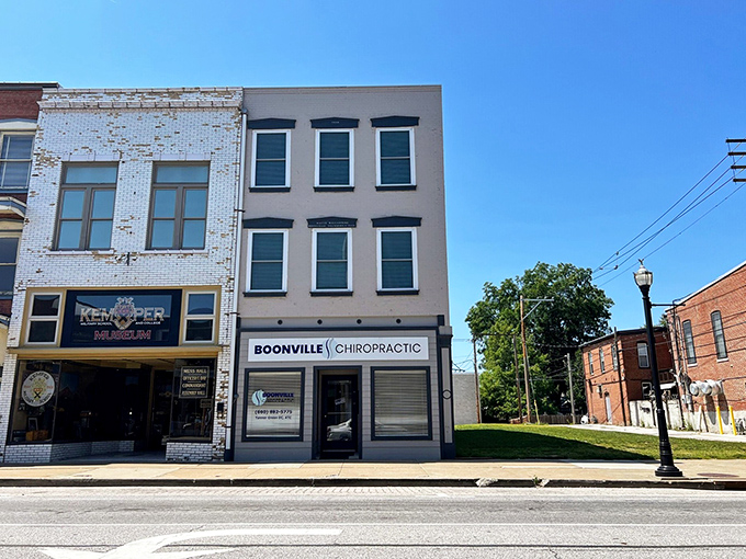 Red brick buildings line up like they're showing off for visitors who appreciate good old-fashioned craftsmanship.