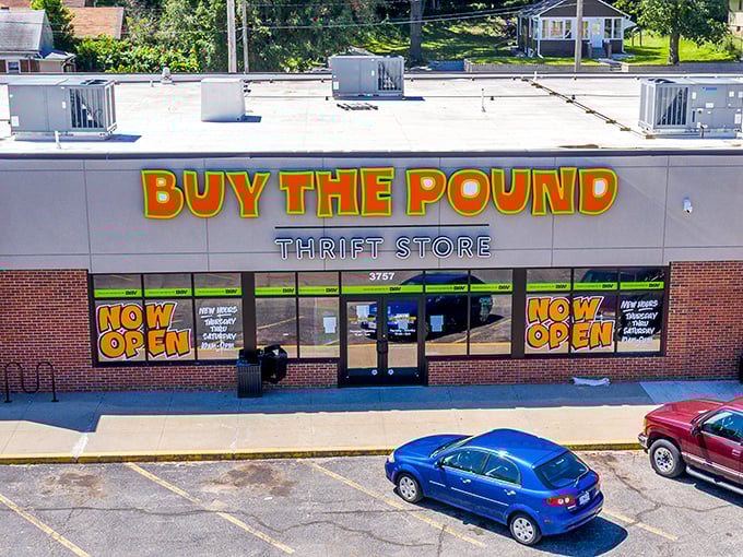 The "NOW OPEN" signs at Buy The Pound welcome you to Missouri's most unique thrifting experience&mdash;where everything's sold by weight!