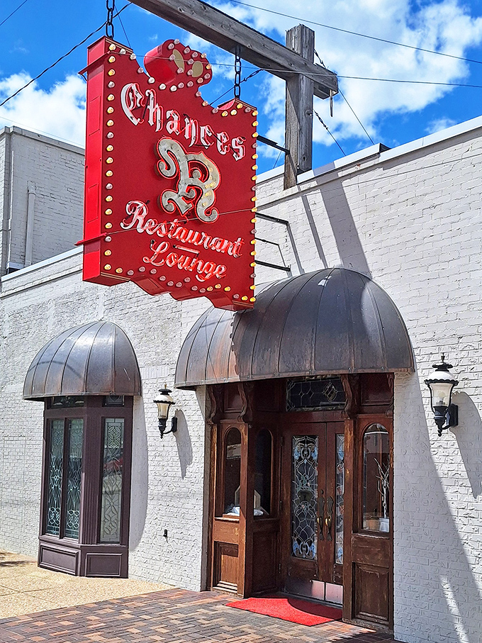 That iconic red sign isn't just for show—it's a beacon guiding steak lovers to one of Nebraska's most beloved dining institutions.