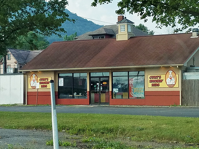 With mountains in the background and smoke in the air, Curt's modest building houses Pennsylvania's answer to barbecue paradise.