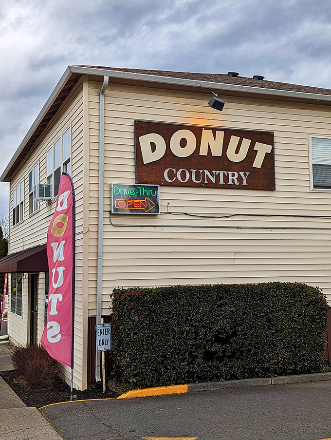 Donut Country's vintage sign has pointed the way to happiness for generations. Some landmarks are measured in maple bars, not years.