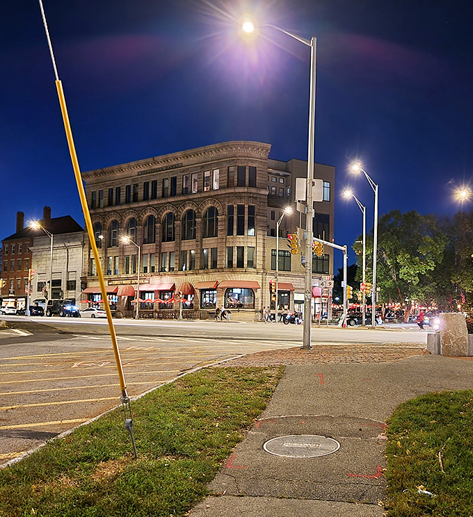 Night lights transform Dover's corner building into an Edward Hopper painting with better dining options and fewer existential crises.