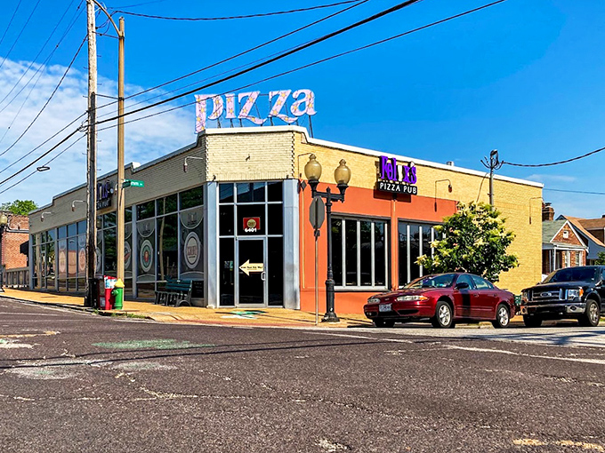 Corner location, bold colors—Felix's announces itself like a delicious rebellion against boring pizza places.