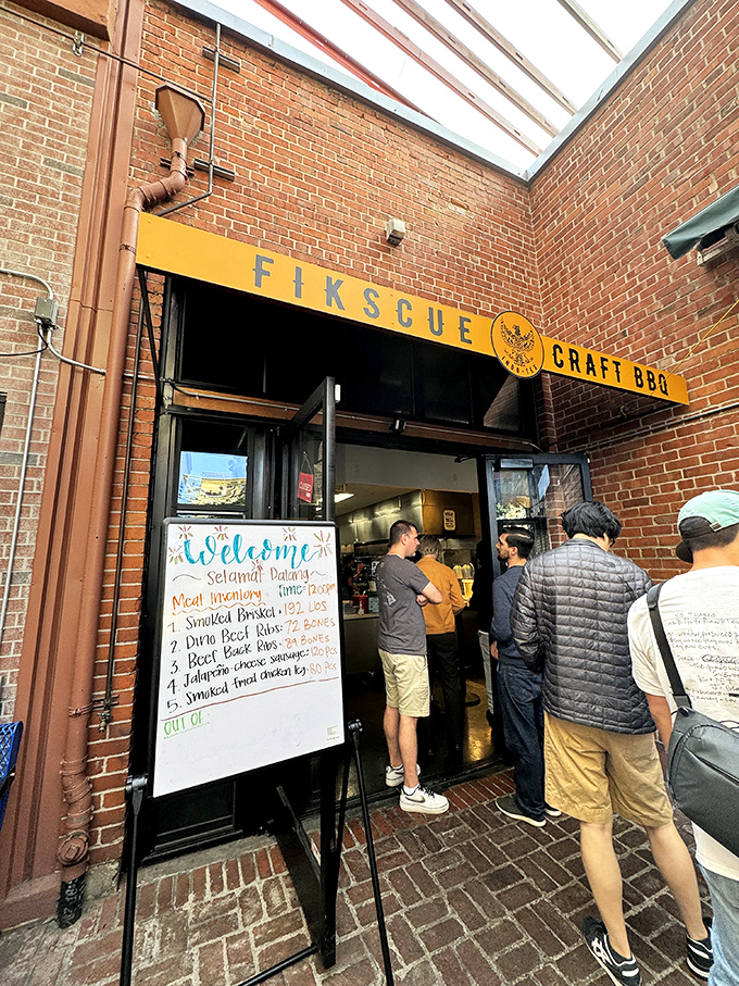 The handwritten specials board at Fikscue tells you this is barbecue that refuses to be confined by tradition.