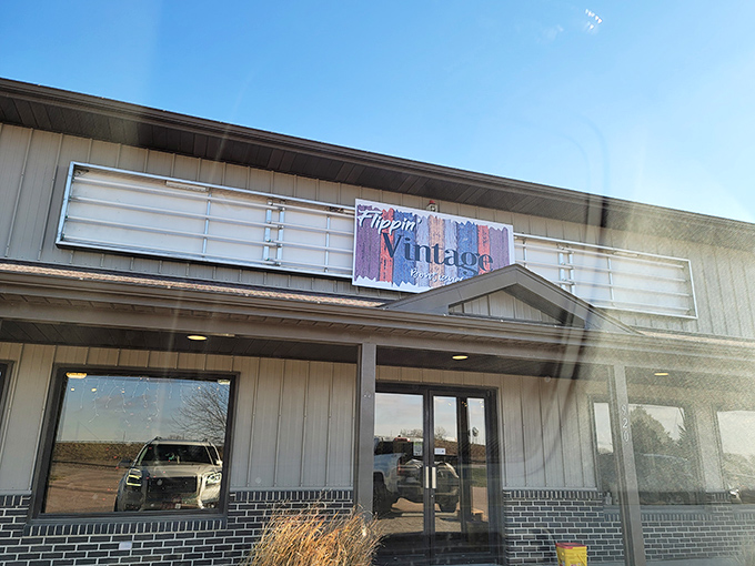 That colorful vintage sign catches sunlight like it's catching the attention of every passing treasure hunter.