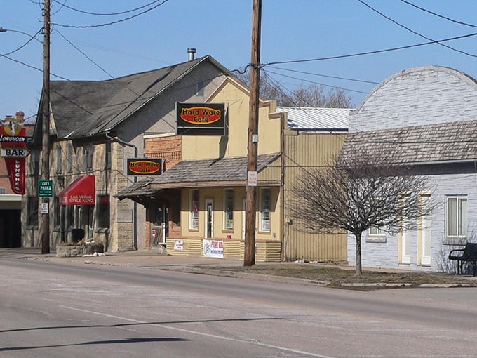 These weathered buildings stand as silent witnesses to generations of river commerce and small-town community spirit.