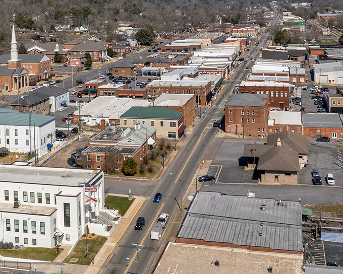 Streets lined with possibility! Fort Payne's affordable downtown corridor proves retirement dreams don't require millionaire budgets.