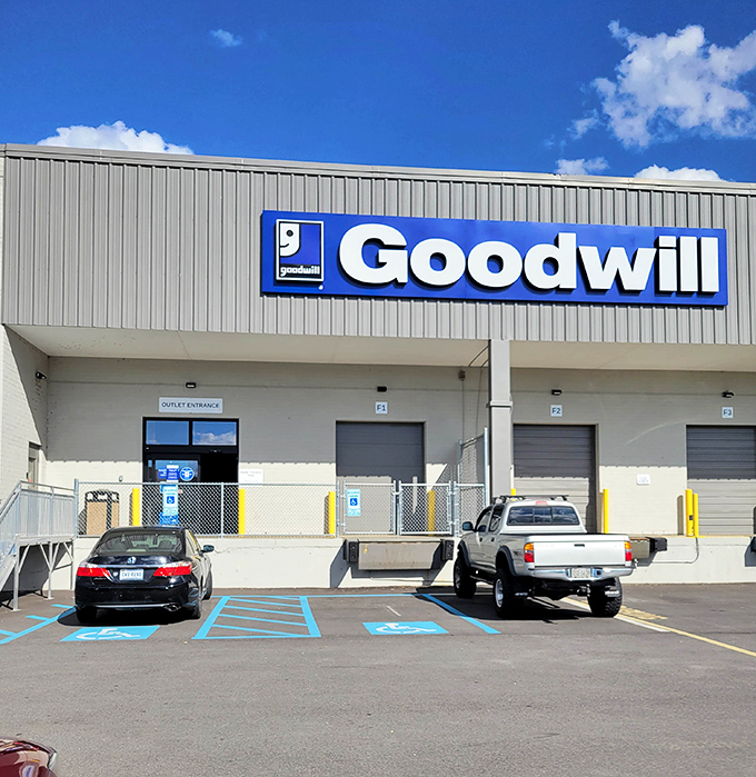 The unassuming exterior of Goodwill's outlet store hides a bin-diving adventure within. Treasures await the brave and patient.