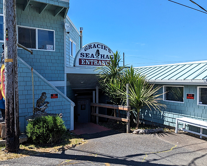 The side entrance to Gracie's promises seafood treasures within this beloved Depoe Bay institution.