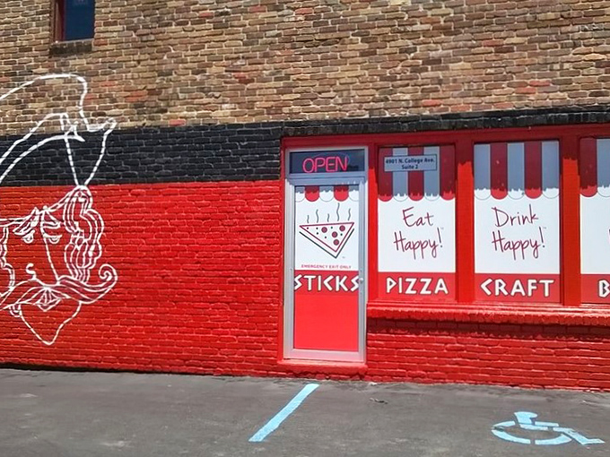 This unassuming brick building houses pizza secrets that have kept Indianapolis residents coming back for "just one more slice."