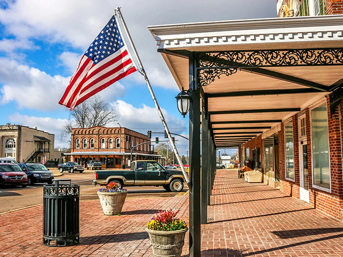 Historic buildings wear their age gracefully here, with covered sidewalks offering shade and a glimpse into the past.