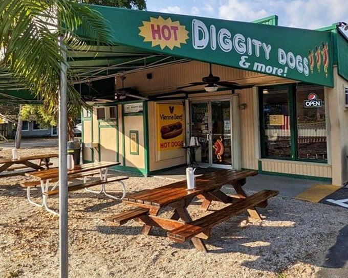 Those dancing cartoon hot dogs on the sign aren't just cute &ndash; they're celebrating the snap-perfect franks served inside this humble stand.