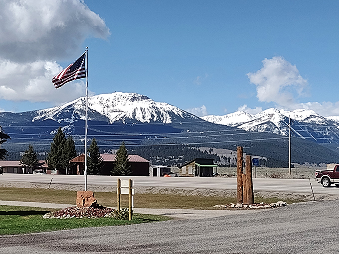 The road through Island Park offers glimpses of snow-capped peaks that seem to follow you wherever you go.