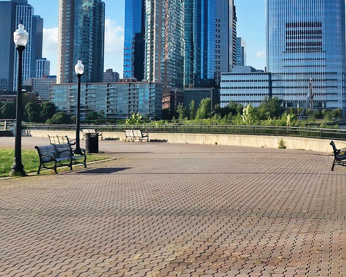 Liberty State Park's waterfront promenade offers front-row seats to the greatest urban theater show on earth.