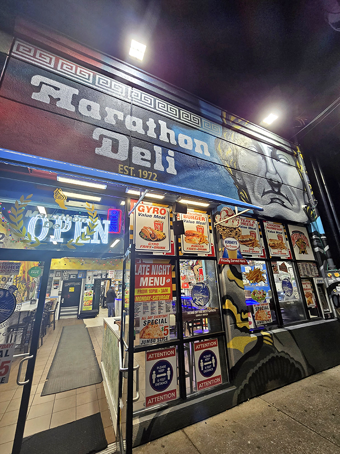 That colorful street art tells you everything: this place serves bold flavors to match its artistic exterior.