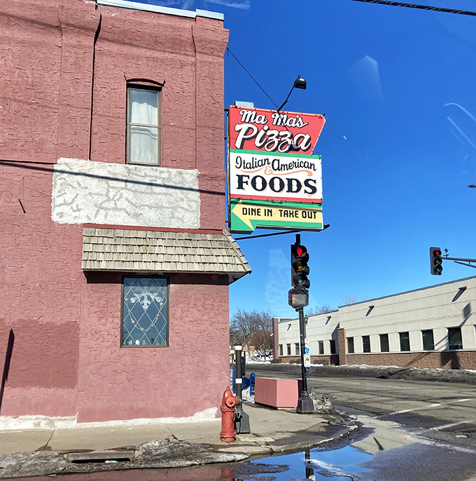 That classic "Mama's Pizza" sign has been guiding hungry Minnesotans to pizza happiness for decades &ndash; and still delivers.