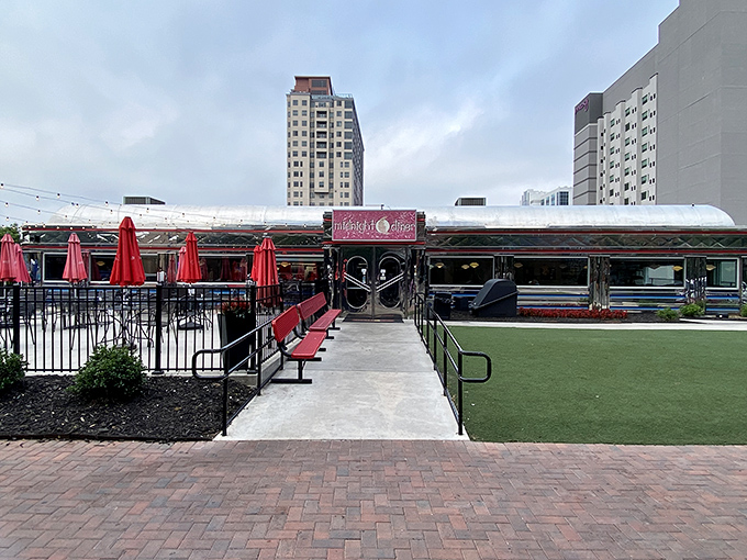 Charlotte's skyline provides the backdrop, but Midnight Diner's outdoor seating area is where the real city drama unfolds&mdash;one bite at a time.