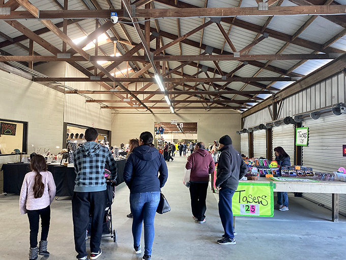 The exposed beam ceiling creates a rustic backdrop for Miller's vendors, where every table holds potential discoveries.