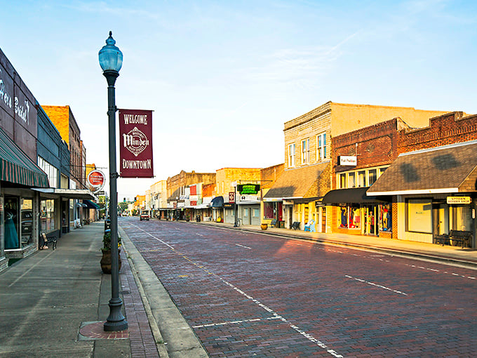 Brick streets and vintage storefronts capture the timeless character of Minden&rsquo;s historic downtown.
