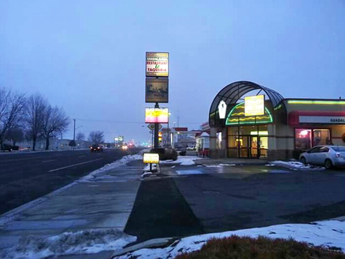 Guadalajara Restaurant's neon glow cuts through Othello's twilight like a beacon for hungry travelers&mdash;promising enchiladas that could make your abuela weep with joy.