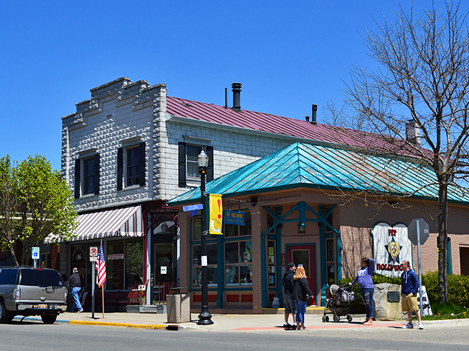 Colorful storefronts line Pentwater's historic main street, where shopping is less about buying and more about connecting.