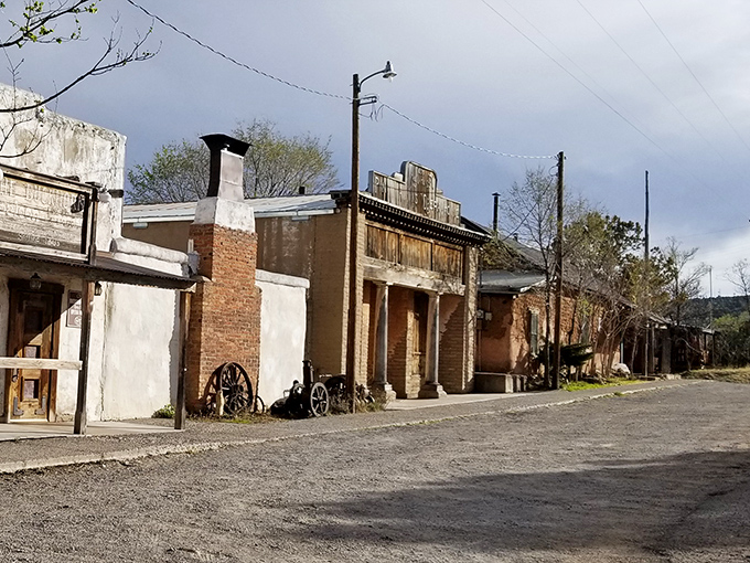 This historic street in Pinos Altos looks frozen in time, where wagon wheels and wooden storefronts transport visitors to the mining boom days.