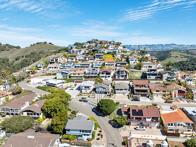 This hillside community cascades toward the ocean like a California postcard come to life.