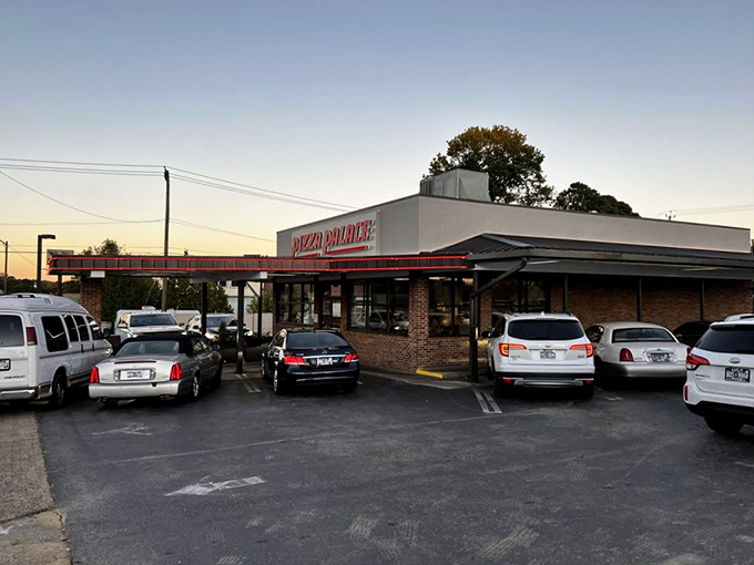 That classic drive-up design says "we've been perfecting pizza while others chase trends."