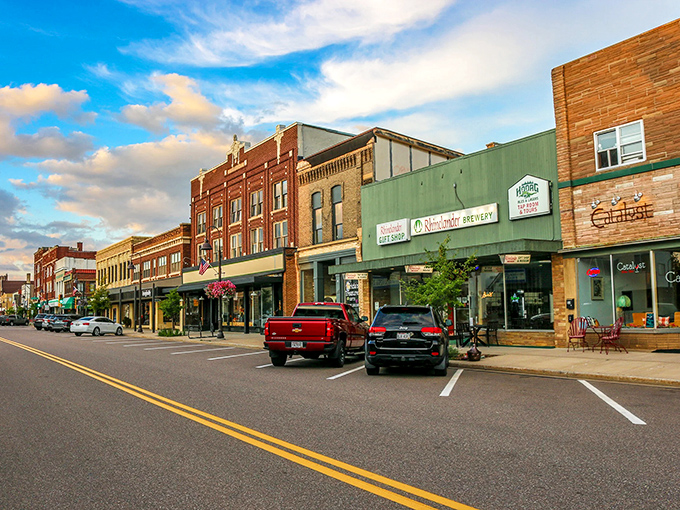Rhinelander's vibrant main street buzzes with local businesses and colorful storefronts, proving small town retirement can be both affordable and exciting.