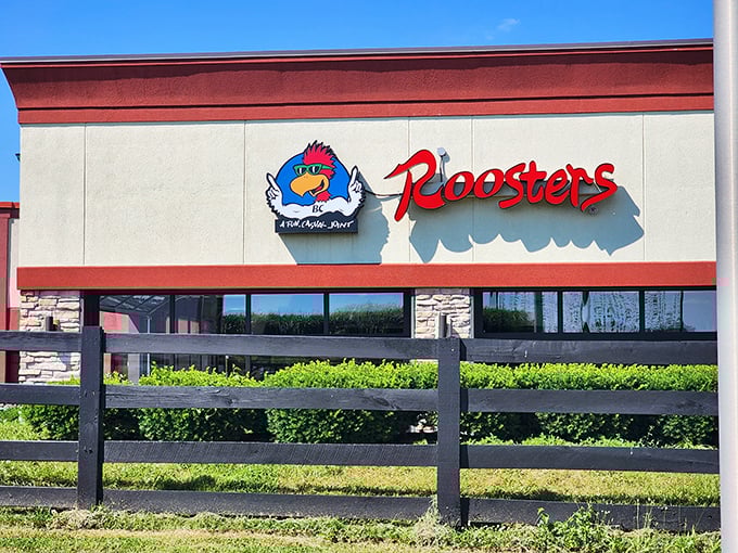 Behind that playful rooster logo and rustic fence lies chicken worth crossing any road for.