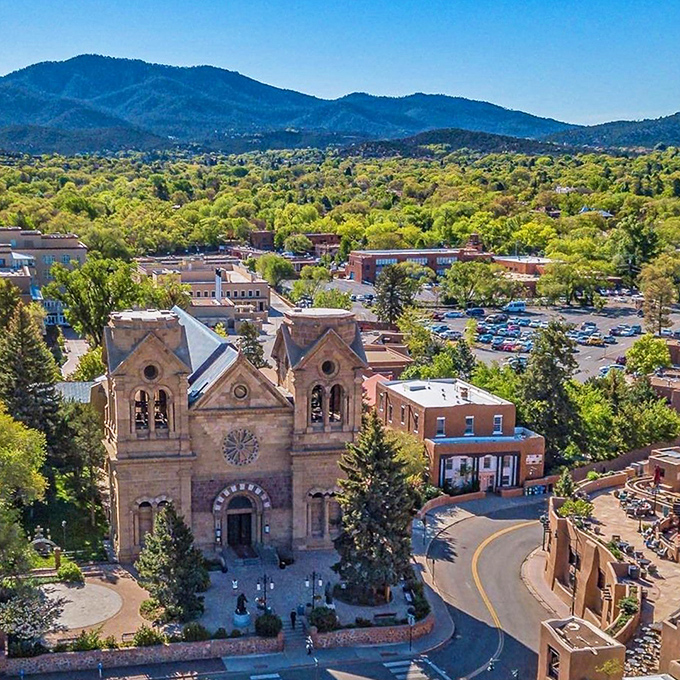 Mountain views frame this historic plaza where centuries of charm meet modern retirement budget realities.