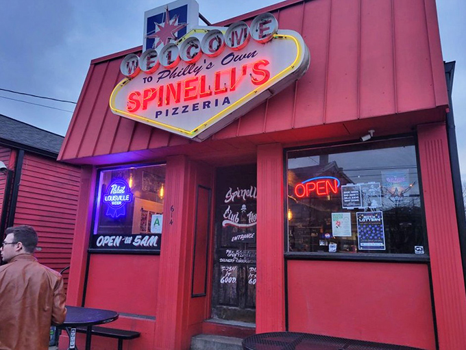 The bold red exterior and retro sign make Spinelli's look like the kind of place where pizza dreams come true.