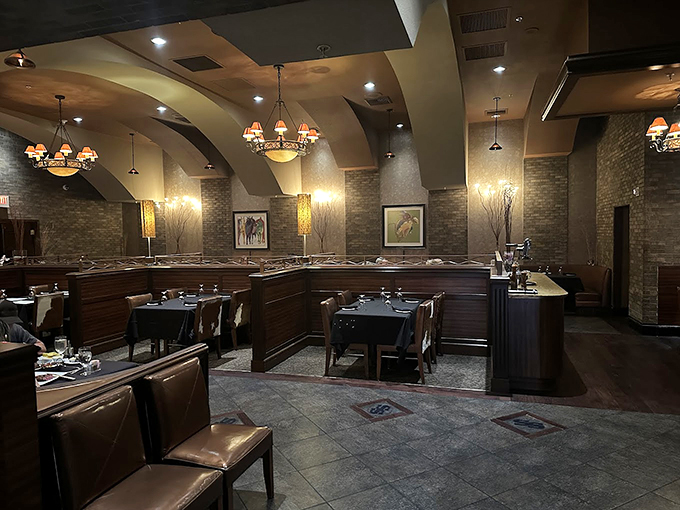 Warm lighting and intimate booths create the perfect setting for savoring every bite of perfectly grilled beef.
