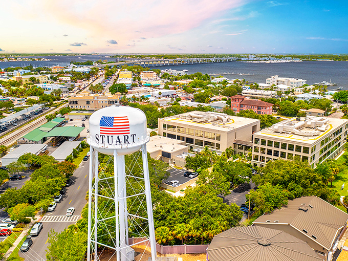 Water tower pride on display! Stuart's iconic landmark stands tall like a patriotic exclamation point over this waterfront gem.