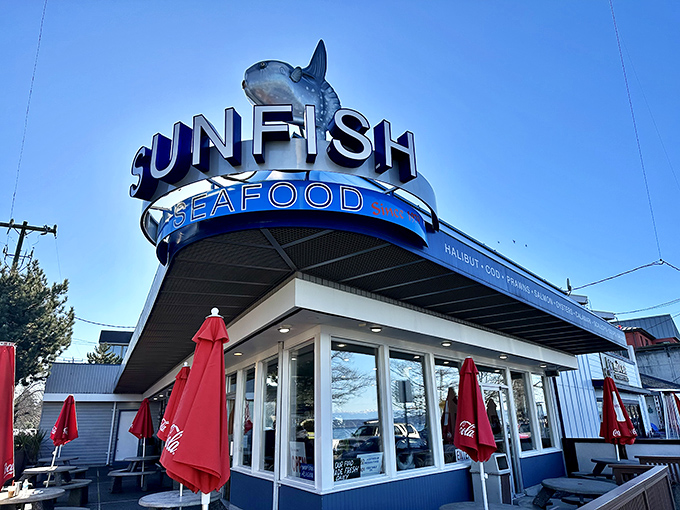 The sleek exterior of Sunfish promises contemporary coastal cuisine where fresh seafood meets Alki Beach's laid-back summer vibes.