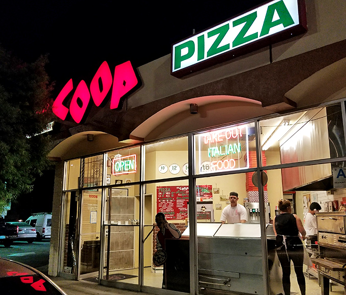 Night owls know The Coop's glowing storefront means late-night pizza salvation. Simple, perfect, and worth finding.