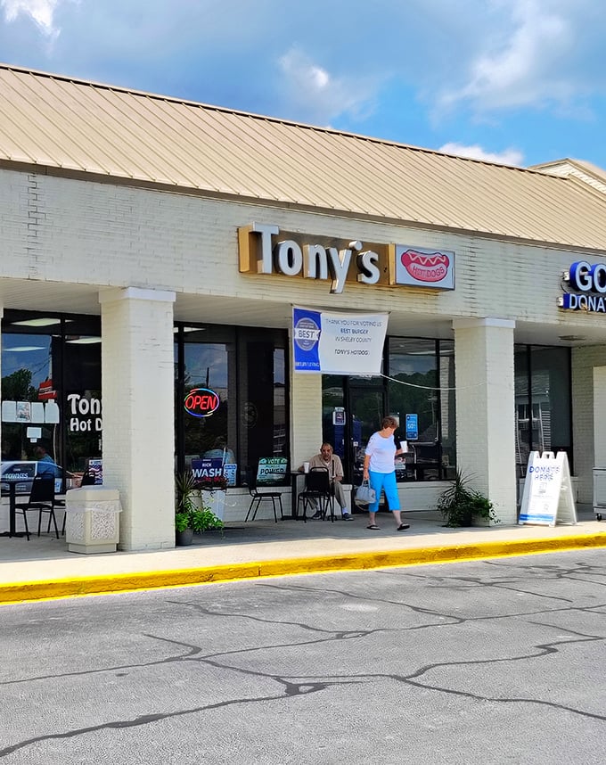 The simple white brick exterior of Tony's hides award-winning dogs that have earned their bragging rights one bite at a time.