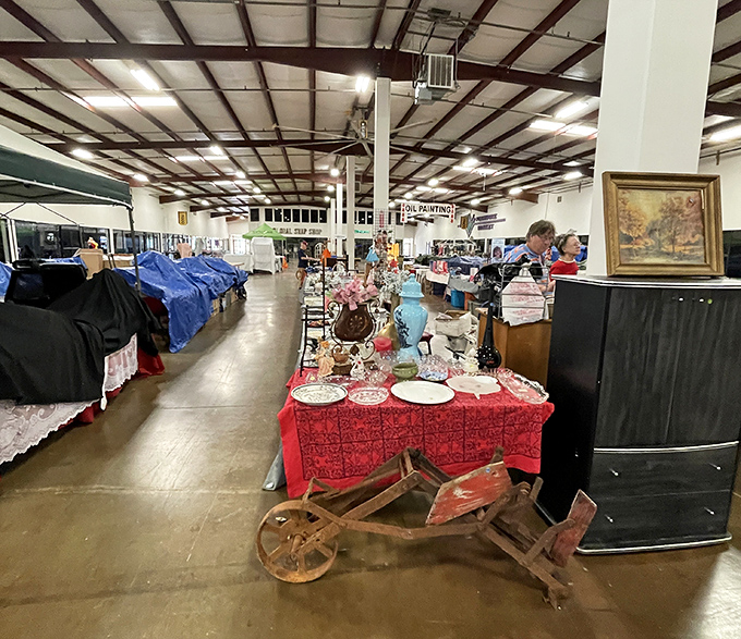 Multiple vendors share the climate-controlled space, each creating their own mini-shop filled with furniture, antiques, and unique finds.