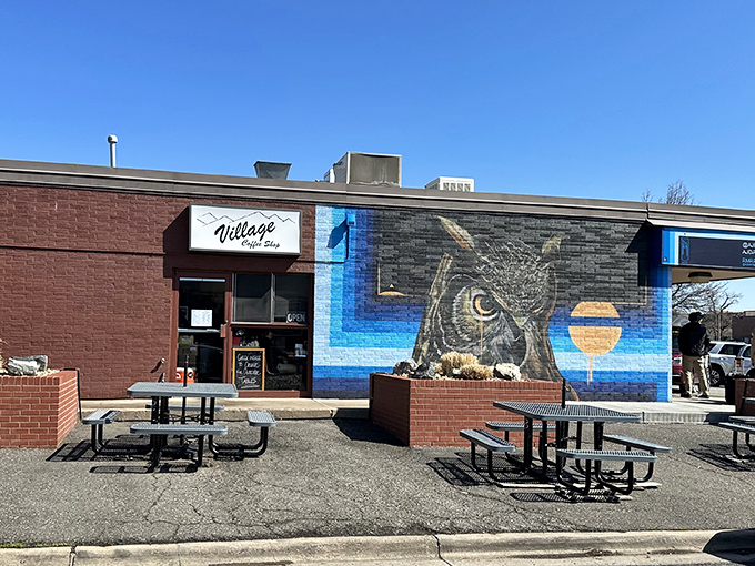 That classic owl mural watches over decades of perfect pancakes and neighborhood coffee conversations.
