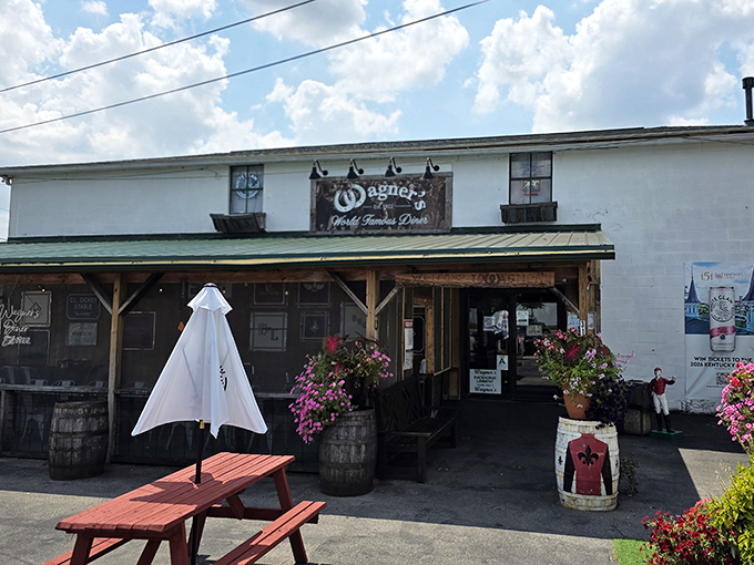 Wooden porch charm and flowering baskets frame the entrance to serious comfort food territory ahead.
