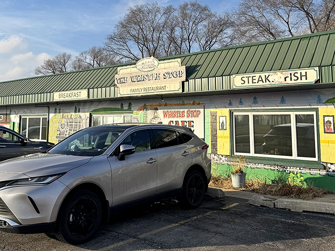 The Whistle Stop's cheerful green roof and painted scenes make this diner a visual treat before you even taste the food.