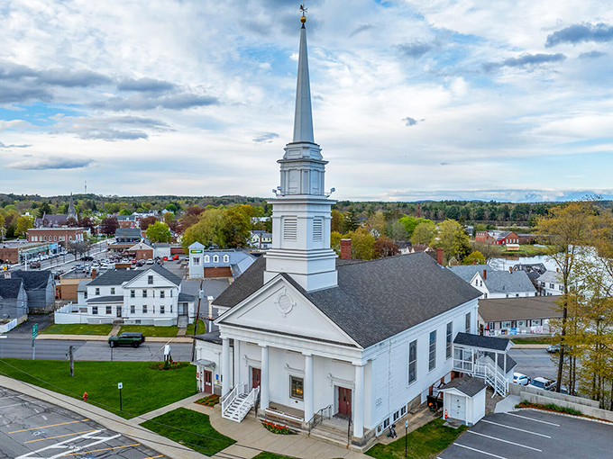 Heavenly affordability! Winchendon's pristine white church spire reaches skyward like your savings potential when monthly expenses plummet.